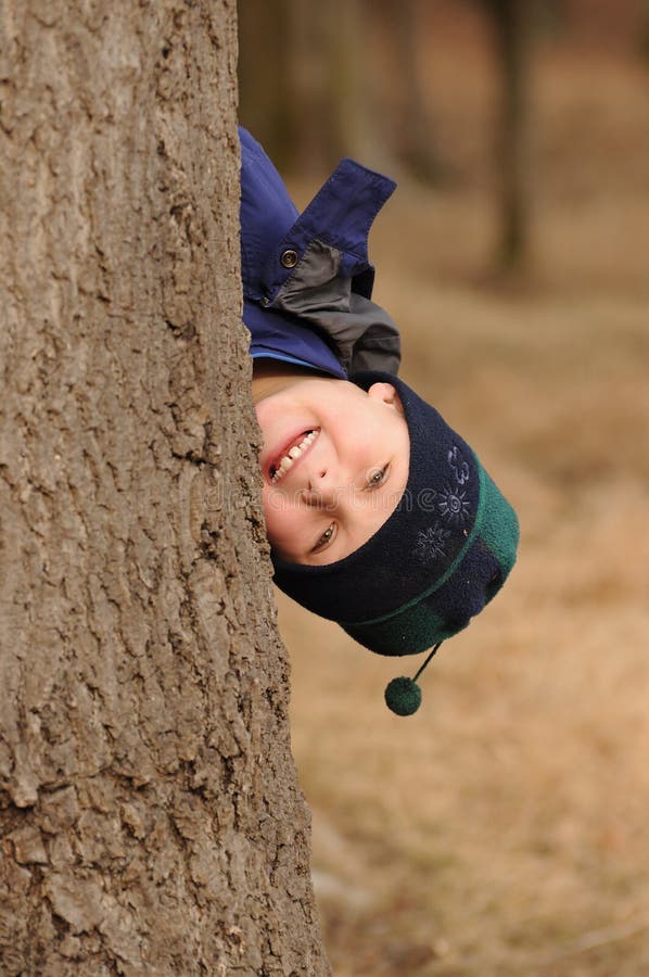 Child Standing on Tree Branch Stock Image - Image of surmount, bough ...