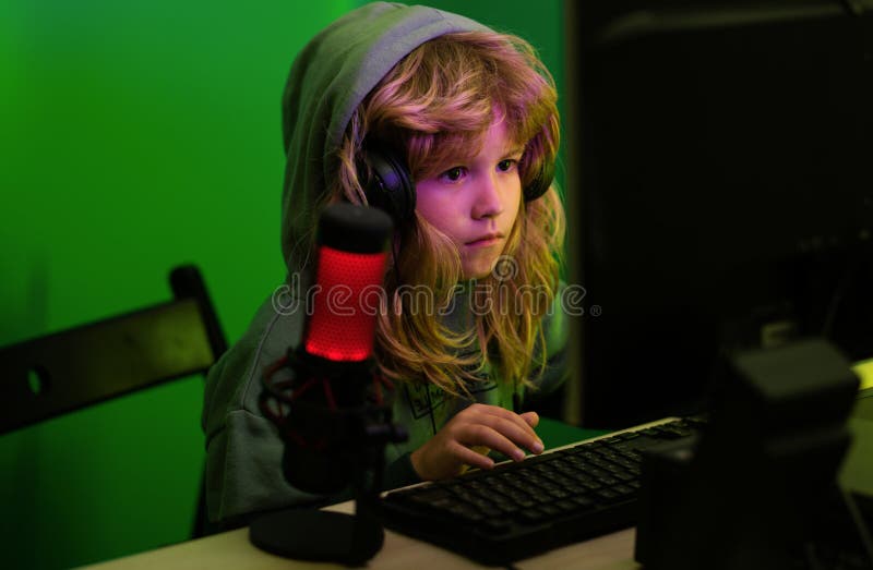 Child Gamer Playing Video Game. Child Plays a Video Game on the Pc ...