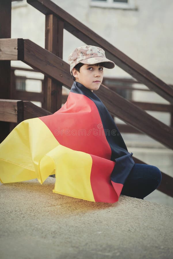 Child with german flag stock image. Image of flag, immigration - 125855713