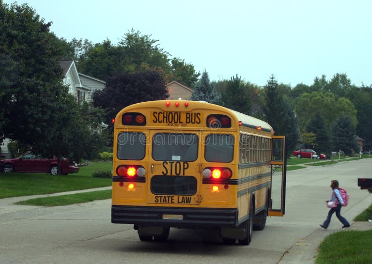Child Getting on School Bus Stock Photo - Image of student, public: 1275006