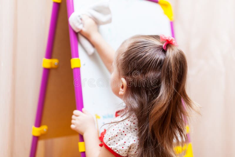 Child Girl Cleaning the White Board Stock Photo - Image of pretty ...