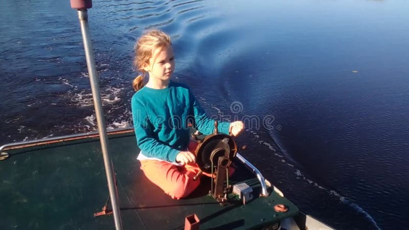 Child a Girl at the Helm of a Boat Stock Video - Video of luxury, helm ...