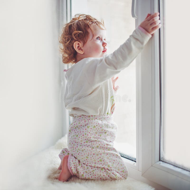 Unhappy, Poor Little Girl Sitting on Asphalt with Drawing Sun. Stock ...