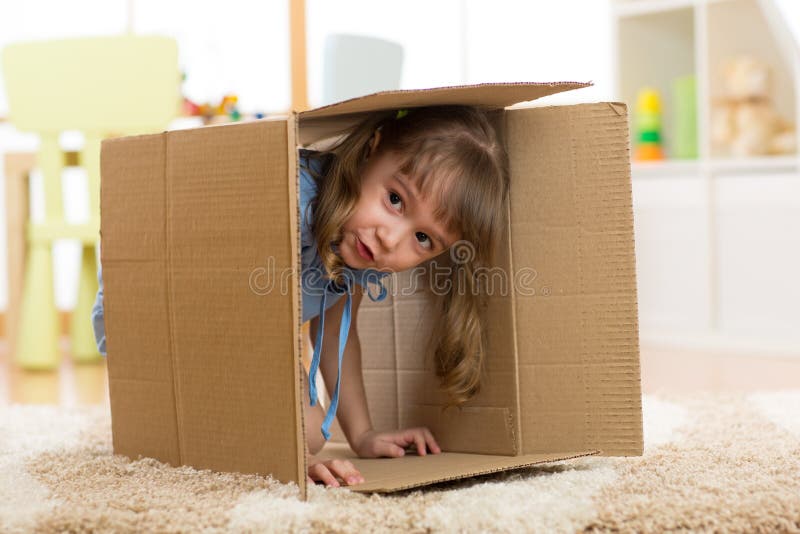 Child Girl Playing Inside a Paper Box Stock Image - Image of ...
