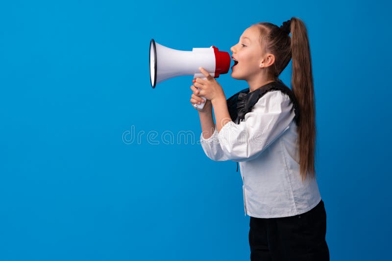Child Girl Using Megaphone Against Blue Background Stock Image - Image ...