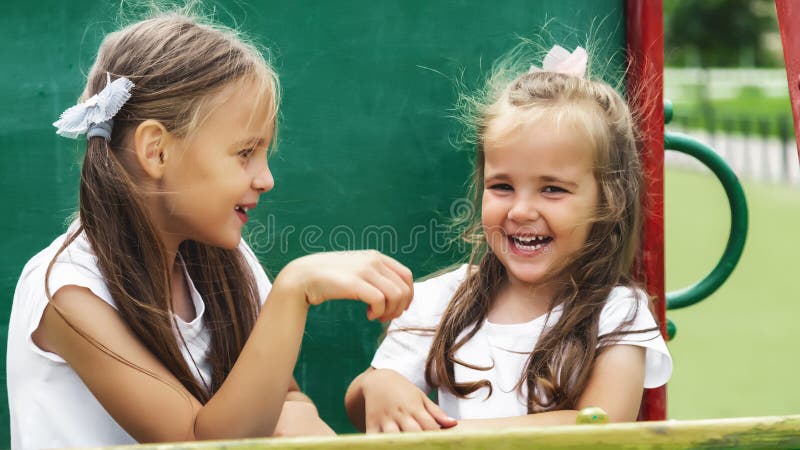 Child Girls Playing Together on the Playground Stock Image - Image of ...