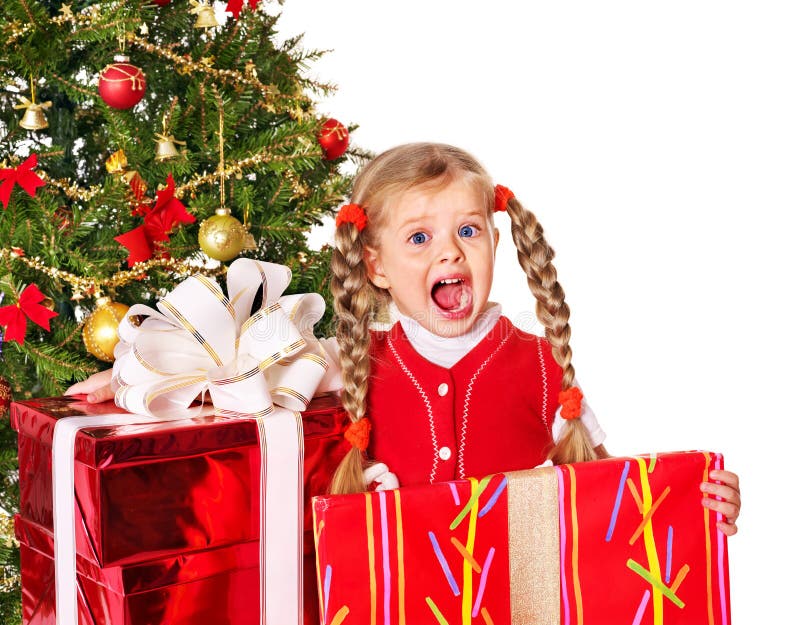 Child Giving Gift Box by Christmas Tree. Stock Photo - Image of child ...