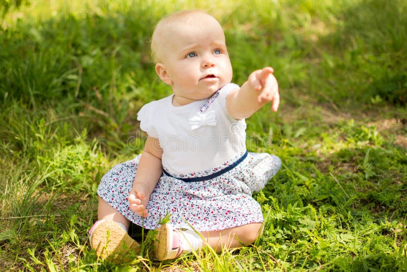 Child on grass stock photo. Image of emotion, growth - 57319250