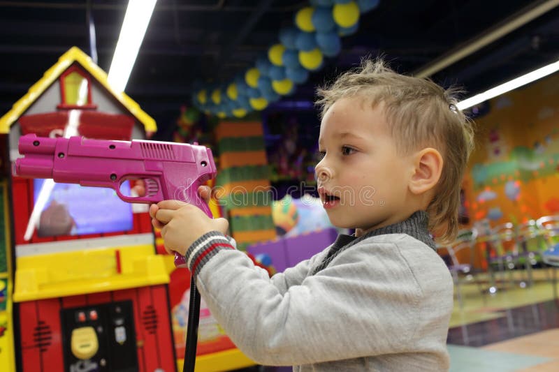 Child with gun stock photo. Image of male, playing, looking - 47781176