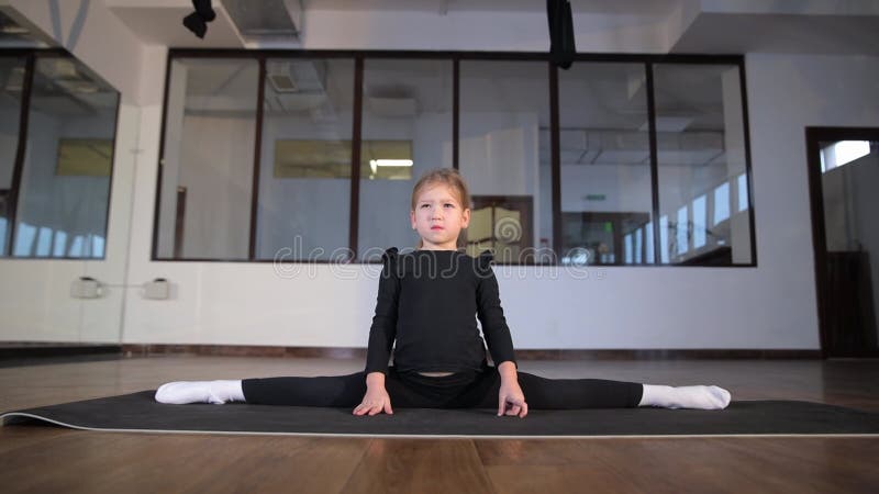 Child Gymnast Demonstrates Extraordinary Flexibility and Focus during ...