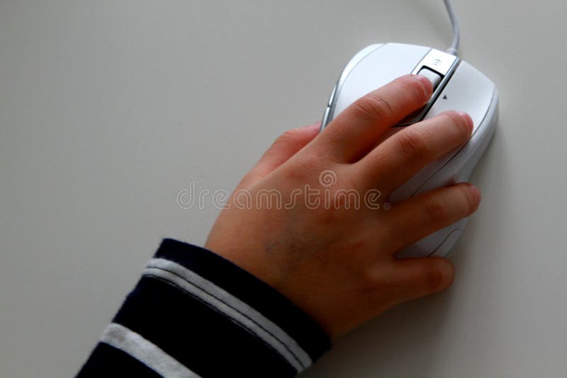 Child Hand with Computer Mouse on White Table Stock Photo - Image of ...