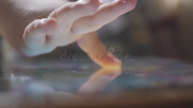 Child Hand Doing Tapping on Tablet Touch Screen Close Up. Stock Video ...