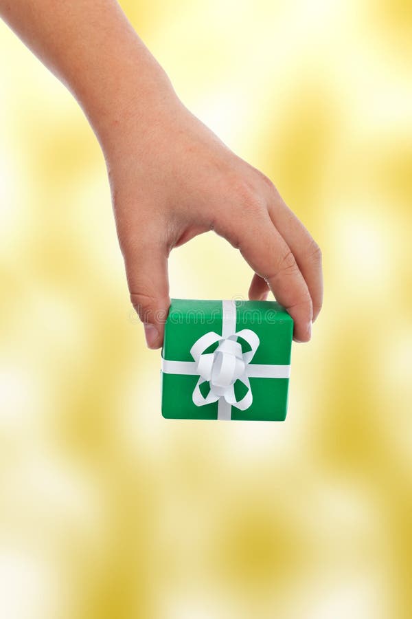 The Joy Of Giving - Small Gift Box In Woman And Child Hands Stock Image ...