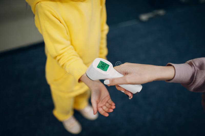 Child Hand Temperature Measurement Check by Laser Thermometer at ...