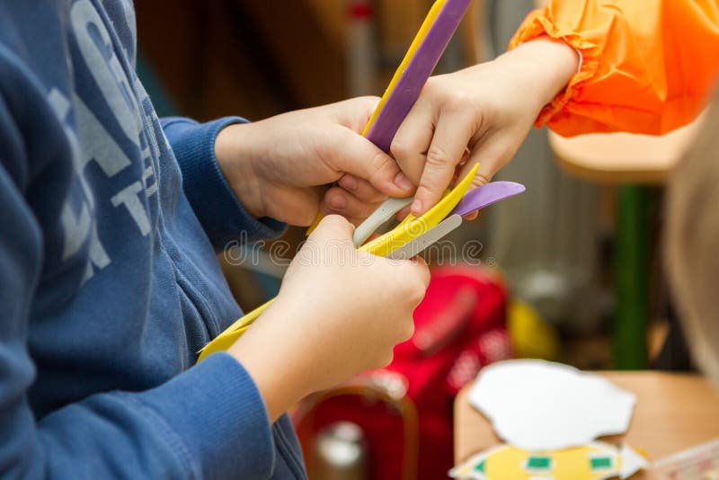 Child handing out stacks. stock image. Image of knowledge - 63204407