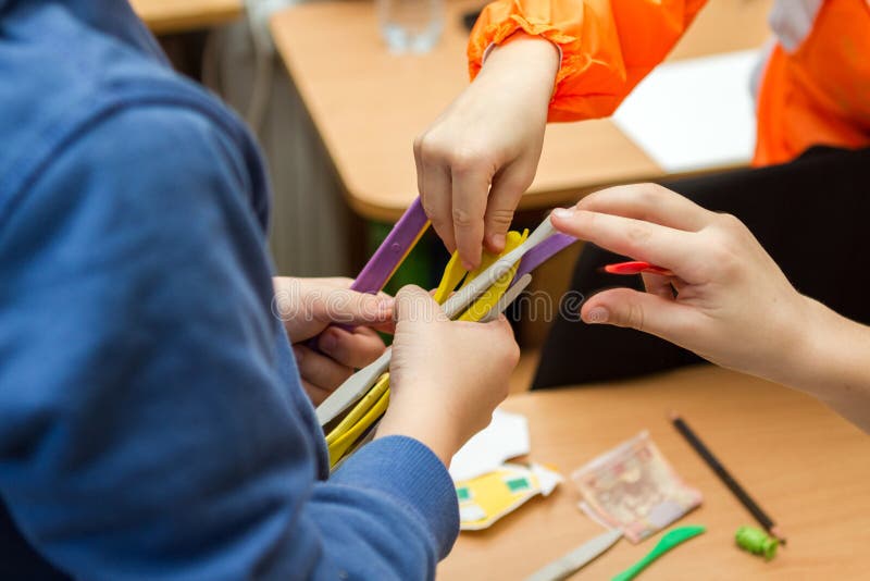 Child handing out stacks. stock photo. Image of imposing - 63204480