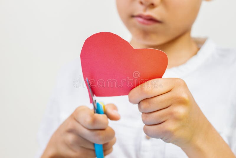 Child Hands Cutting Red Paper Heart with Scissors Stock Photo - Image ...