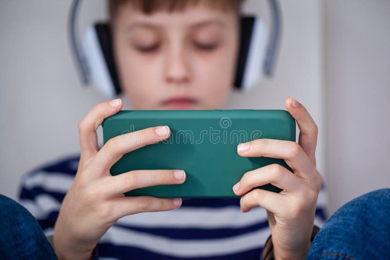 Child Hands Holding Smartphone Close-up for Playing or Learning ...