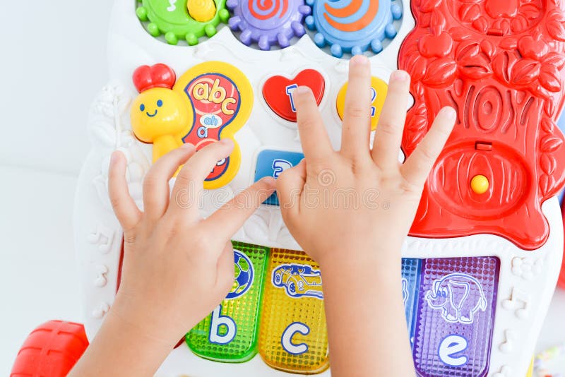 Child Hands on Learning Toy Suggesting Early Education Stock Image ...