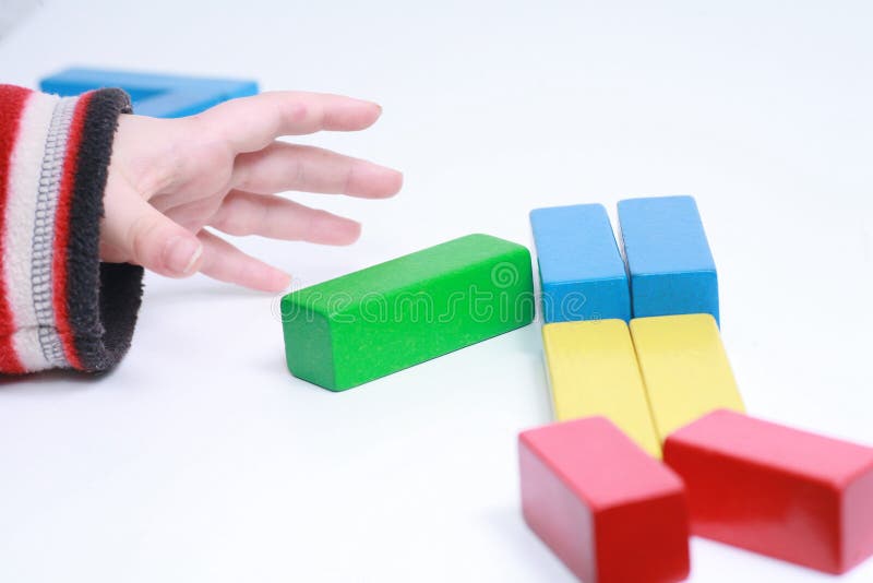 Child hands play toy stock image. Image of baby, build - 27095799