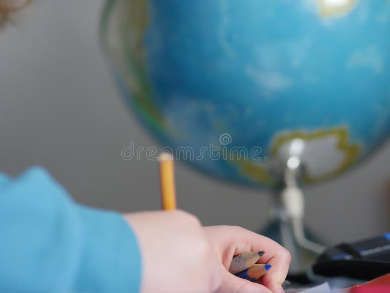 Child Hands Writing in Front of Globe Stock Image - Image of book ...