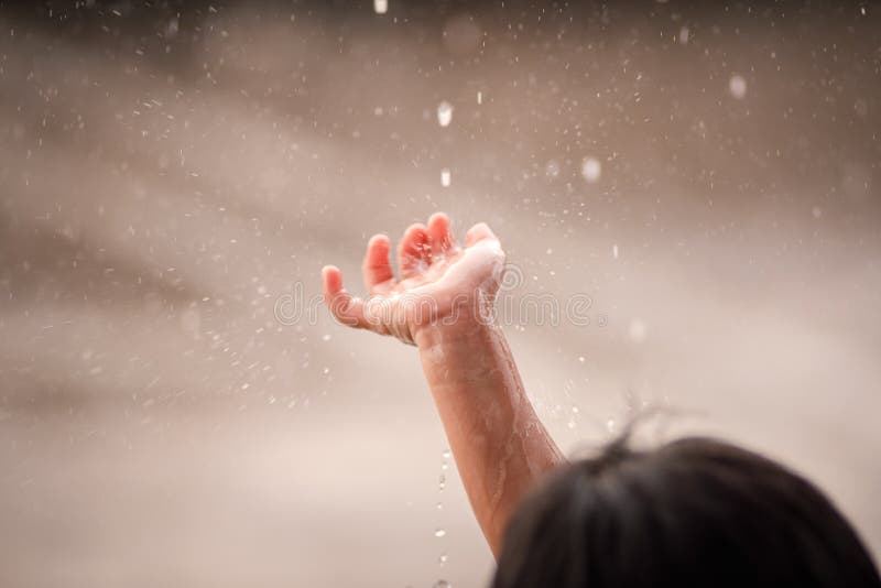 Catching Rain Hand Stock Photos - Download 422 Royalty Free Photos
