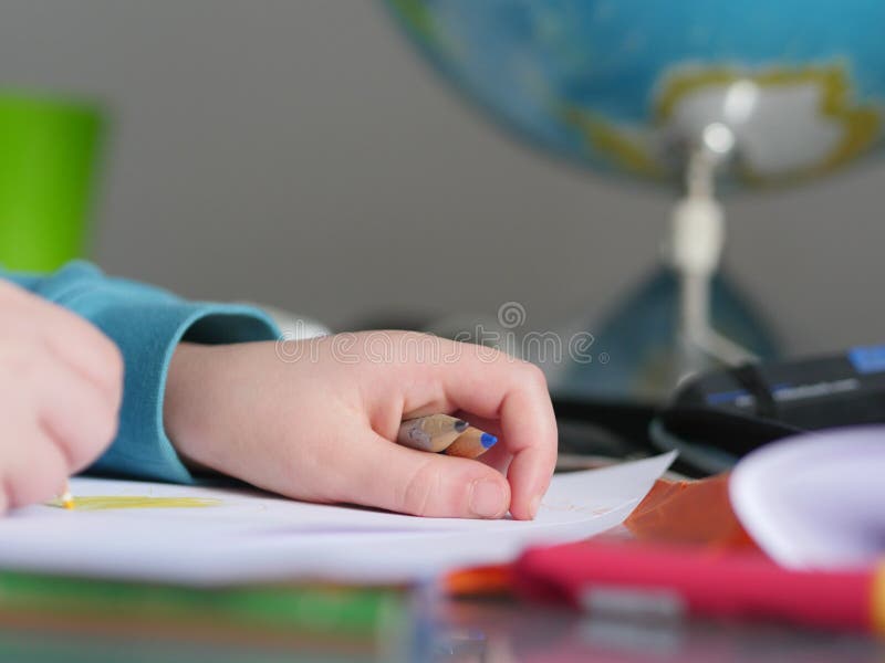 Child Hands Writing in Front of Globe Stock Photo - Image of book ...