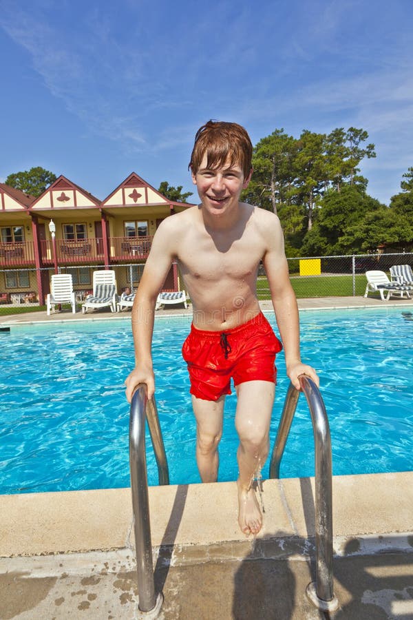 Child has fun in the pool stock photo. Image of teenager - 40565502