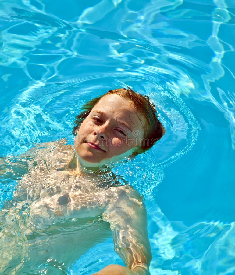 Child has fun in the pool stock photo. Image of active - 35782498