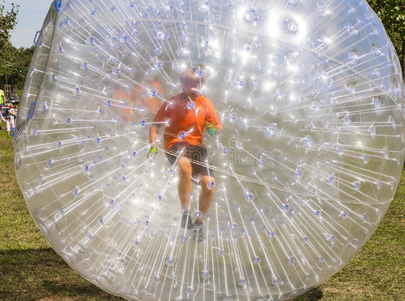 Child Has Fun in the Zorbing Ball Stock Image - Image of kids, friendly ...