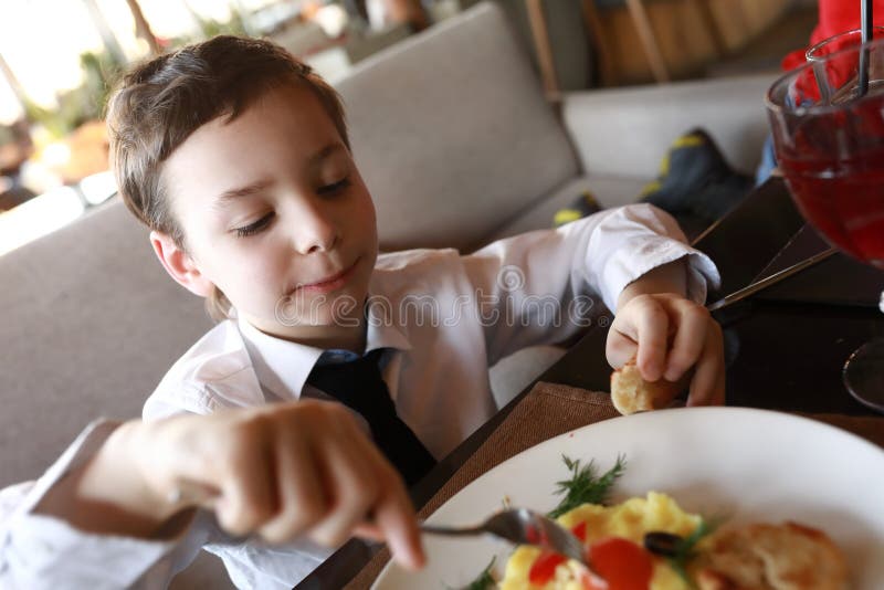 Child has lunch stock photo. Image of gourmet, hand - 141577988