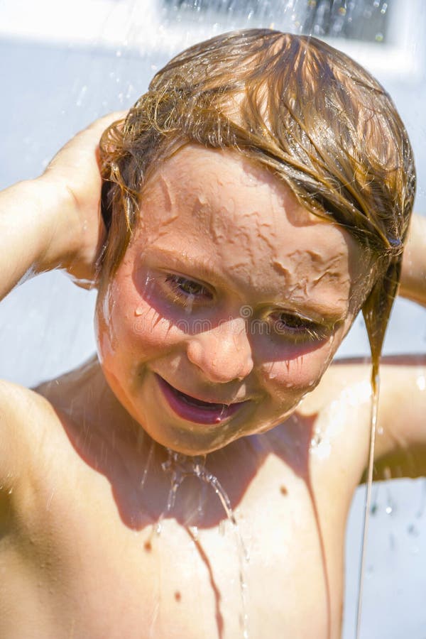 Child Has a Refreshing Shower in the Heat Stock Image - Image of ...