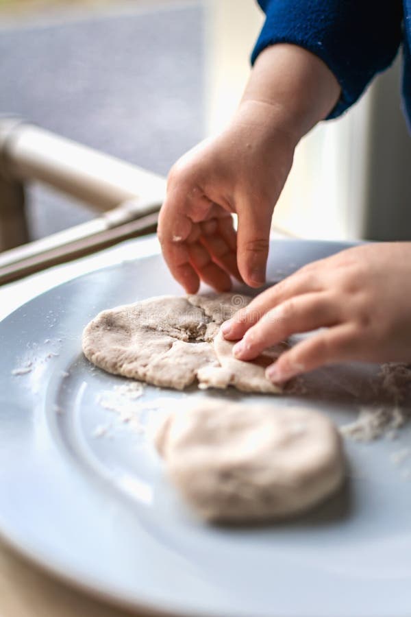 Child Having Fun Modeling Dough, Authentic Activity for Fine Motor ...