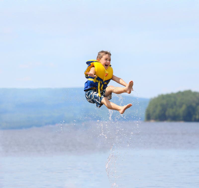 Child Having Fun in Water during Summer Stock Photo - Image of lake ...