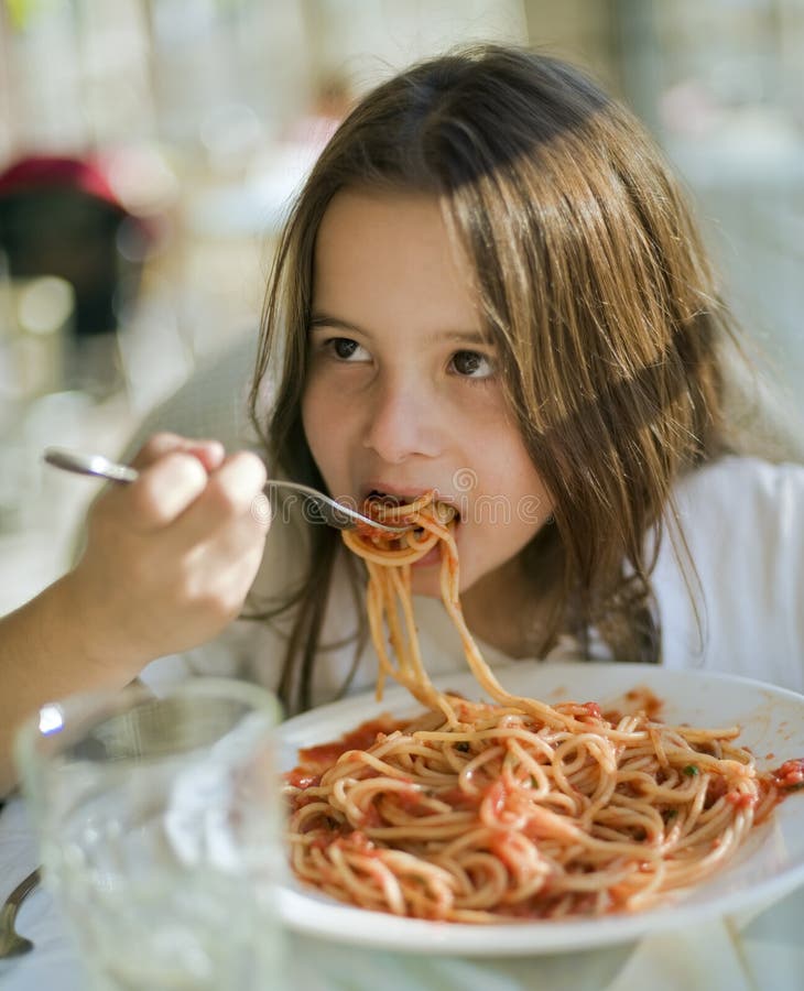 Child having spaghetti stock image. Image of boiled, meal - 7023477