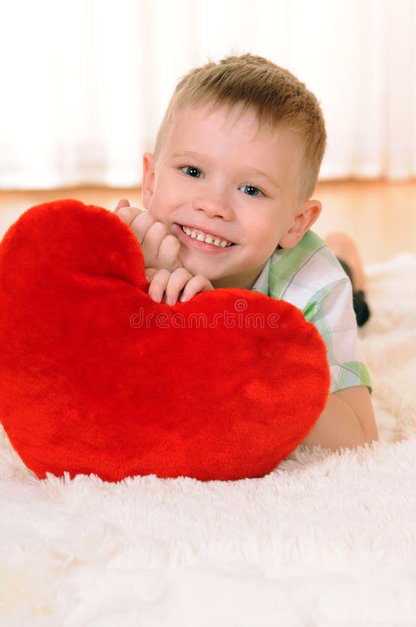 Child with a heart stock photo. Image of childhood, present - 22489154