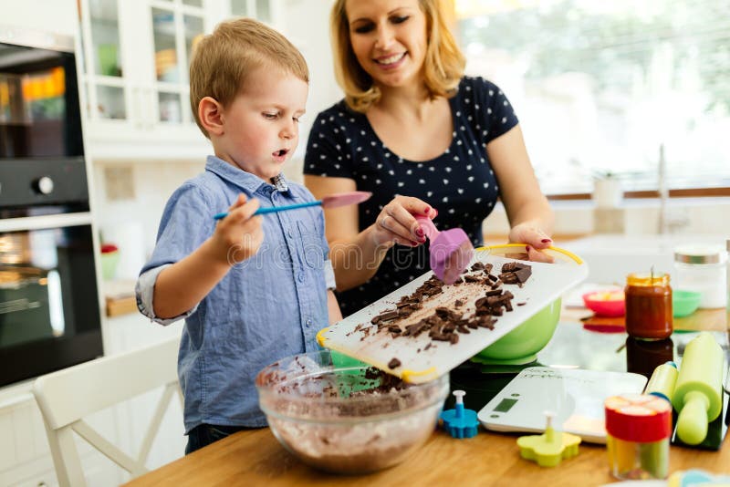 Child Helping Mother Bake Cookies Stock Image - Image of assistance ...
