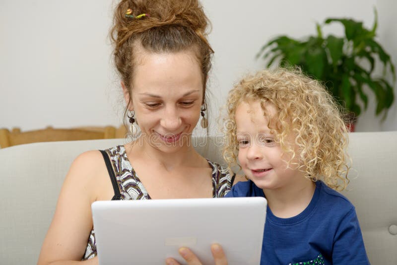 Child Her Mom Uses Tablet Stock Photos - Free & Royalty-Free Stock ...