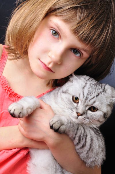 Child with her pet cat stock photo. Image of hugging - 24118788