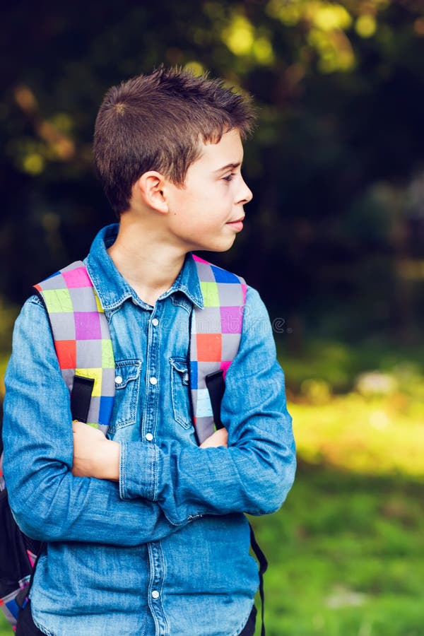 Child with his backpack stock image. Image of education - 60381617