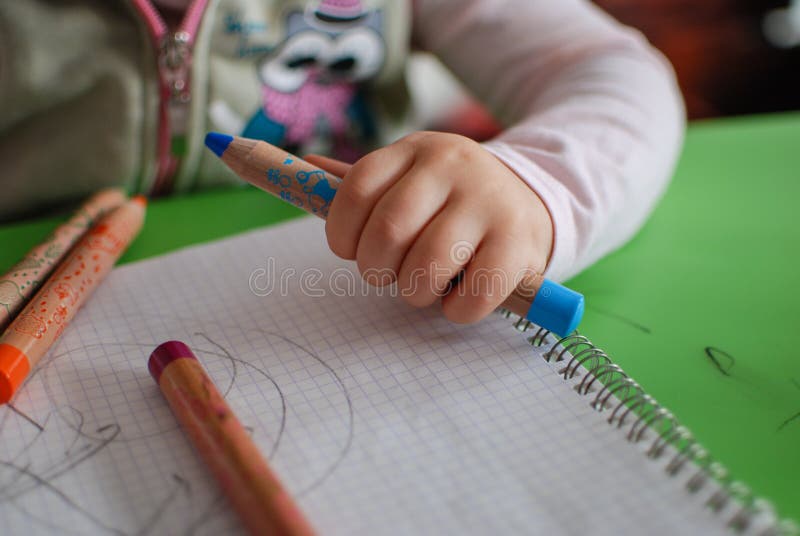 Child holding crayons stock photo. Image of young, work - 84964556