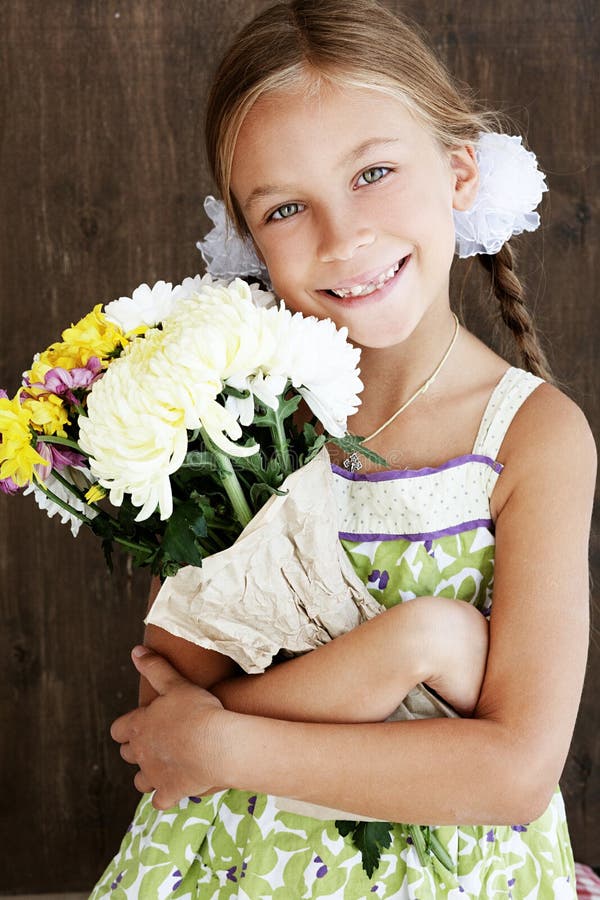 Child holding flowers stock photo. Image of child, chrysanthemum - 34027584
