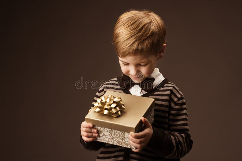 Child Holding Cardboard Box Packed with Toys Stock Image - Image of ...