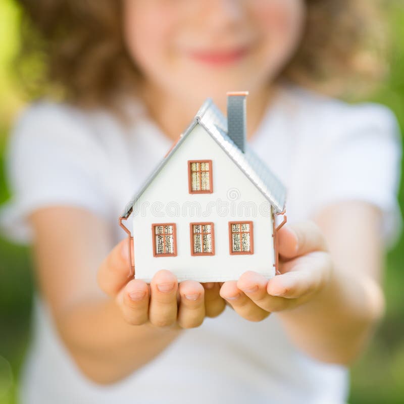Child holding house stock image. Image of house, showing - 37858717