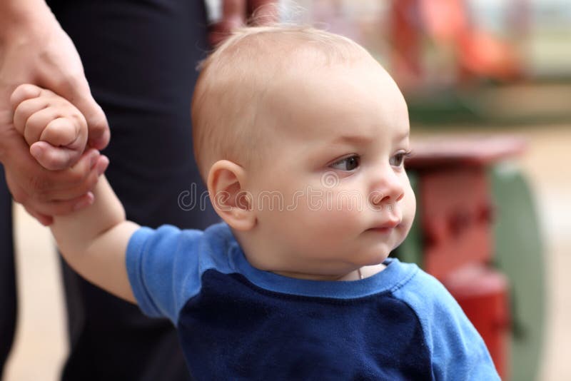 Child Holding on Parent S Hand Stock Image - Image of calm, lifestyles ...