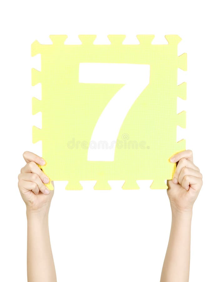 Child is holding seven stock photo. Image of holding - 17375298