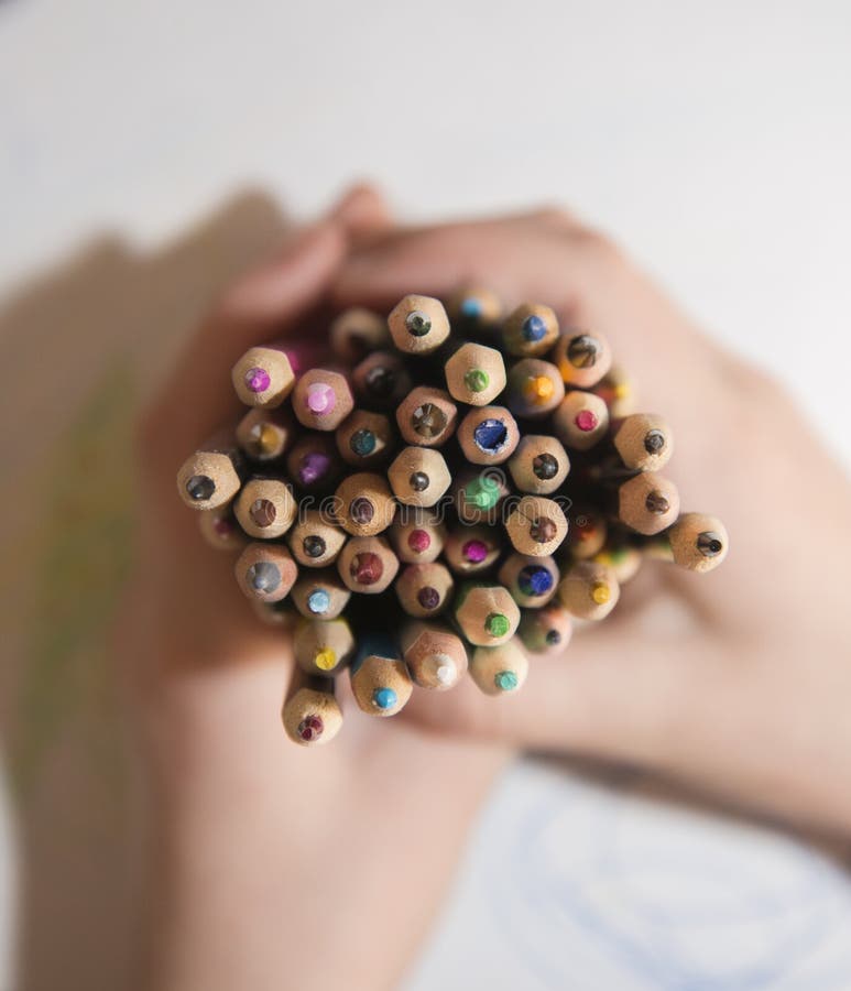 Child Holding a Stack of Pencils. Stock Image - Image of fantasy ...