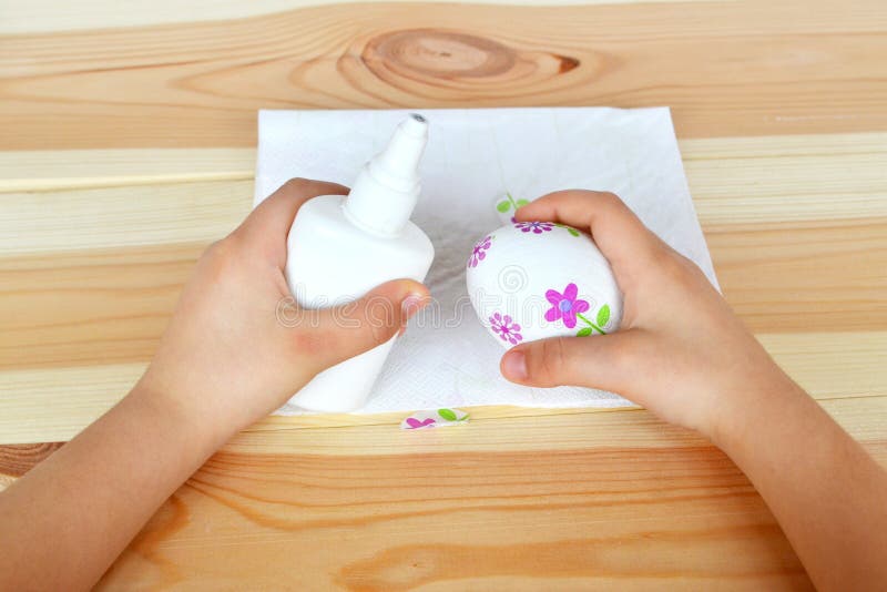 Child Holds a Decoupage Easter Egg and Glue Stock Image - Image of ...