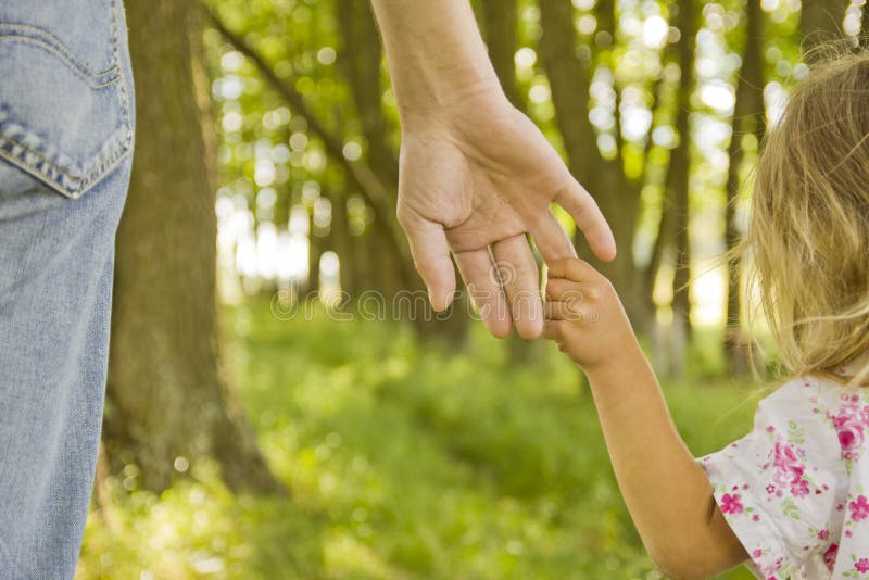 Hand of Parent and Child in Nature Stock Photo - Image of holding ...