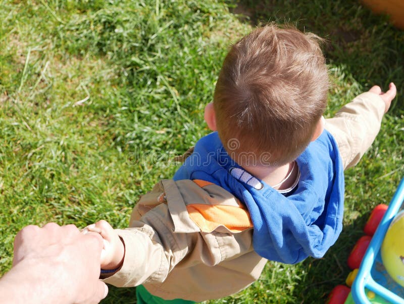 The Child Holds the Hand. Top View Stock Image - Image of family ...